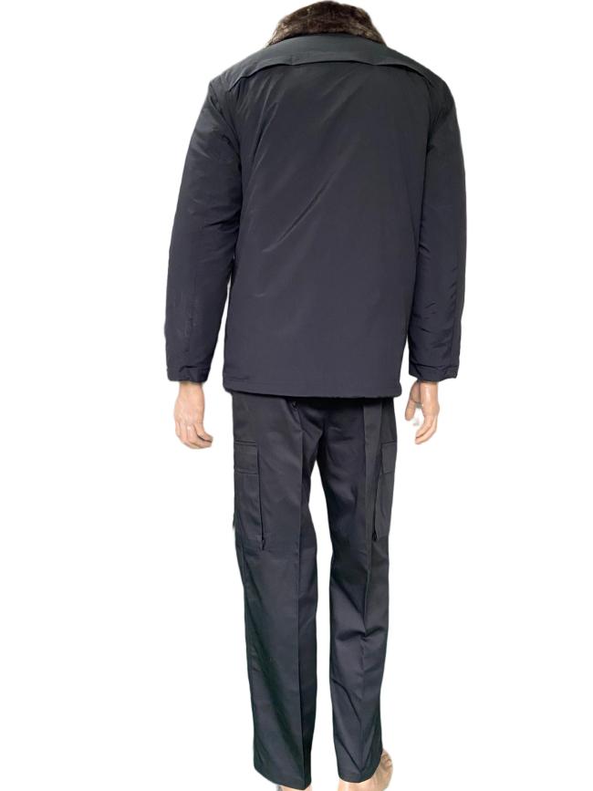 Military jacket being worn with tactical gear