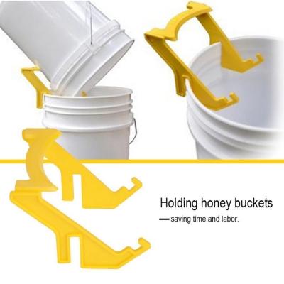 Cina Strumenti per la raccolta del miele di plastica, estrattore di Tesoro Bucket Holder Per Tesoro in vendita