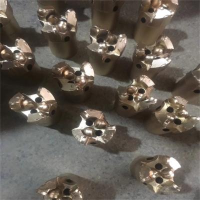China 75mm 3 Wings Concave PDC Coreless Rock Drill Bit for Well Mining Borehole Construction Project for sale