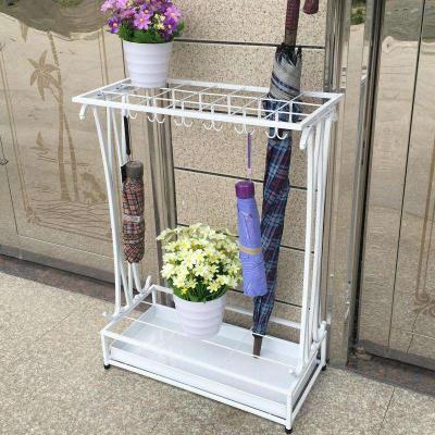 Китай Подставка для хранения зонтов в холле отеля, 10 ячеек, 21 ячейка, многоцелевая металлическая подставка для зонтов продается