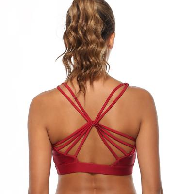 China Back cross design sexy fitness wear yoga tank top solid sports bra sets for women for sale