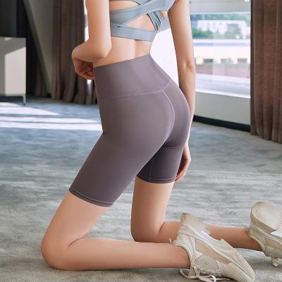 China Peach Butt Lifting High Waisted Female Knee Length Pants Gym Athletic Workout Shorts Women Yoga Leggings for sale