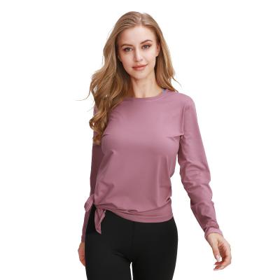 China Quick Dry Long Sleeve Running Top Pure Color Loose Activewear Women Breathable Gym Yoga Top Irregular Twisted Sport wear Women for sale
