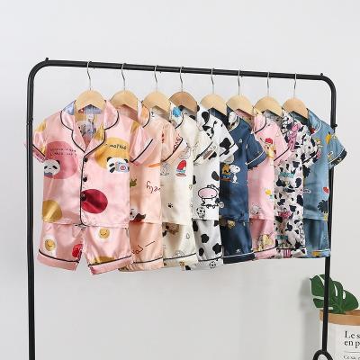 China New summer cartoon lovely boys and girls sleepwear short ice silk pajama for kids wholesale pajamas for children for sale