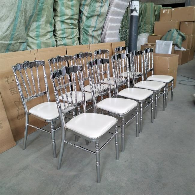 Close-up of metal chair frame and cushioned seat