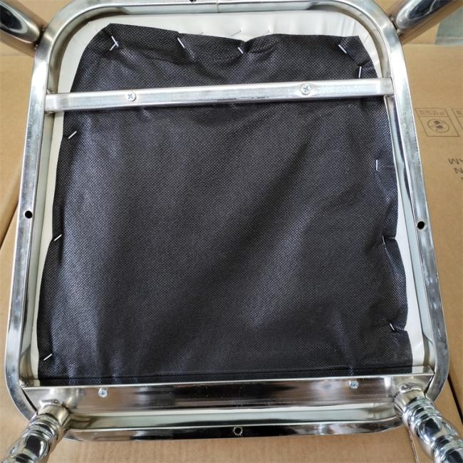 Multiple metal chairs arranged for event seating