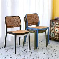 China Rattan Restaurant Chair Plastic Stackable PP Plastic Dining Armchair for sale