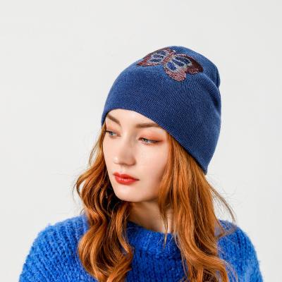 China JOINT Butterfly Sequins Beanie Hat Knit Cap Hats Custom Winter Beanie for sale