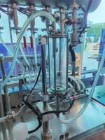 China 220V 50hz Automatic Liquid Bottle Filling Machine Vacuum Overflow Type for sale