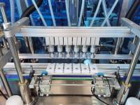 China 220V 50hz Automatic Liquid Bottle Filling Machine Vacuum Overflow Type for sale