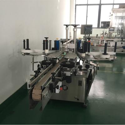 China OEM ODM Oil Bottle Labeling Machine Front And Back Labeling Machine 1500BPH-9000BPH for sale