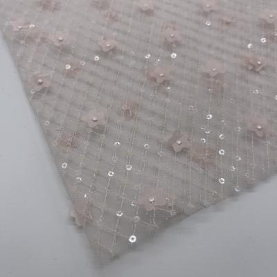 Cina Disegni Glitter ricamo tessuto leggero M13-029 in vendita