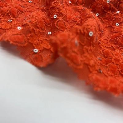 Cina Glitzy Sequins Embroidery Design 100% Polyester Tessuto di colore rosso per stoffa in vendita