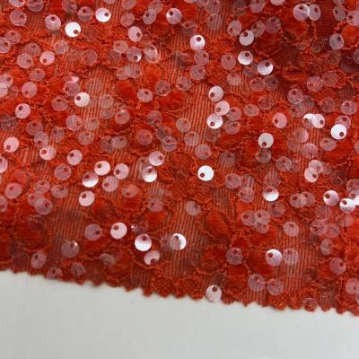 Cina Glitzy Sequins Embroidery Design 100% Polyester Tessuto di colore rosso per abiti in vendita