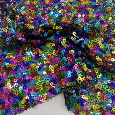 China Glitzy Sequins Borduurwerk 95% polyester 5% spandex kleurrijke sequin stof voor vest Te koop