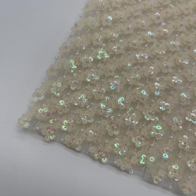 Cina Sequins Fiori Modello Design Niche Stile colore beige 100% tessuto di poliestere per abbigliamento in vendita