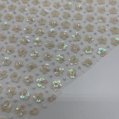 Cina Sequins Fiori Modello Design Niche Stile colore beige 100% tessuto di poliestere per abbigliamento in vendita