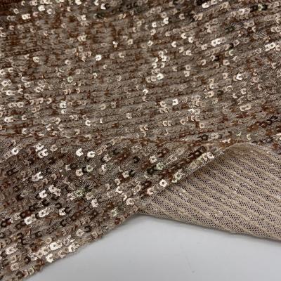 Cina Stoffa ricamata di paccole 95% P 5% SP colore oro per gonne di paccole in vendita
