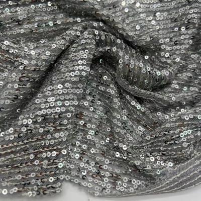 Cina Modello Scarpe di abbigliamento Tessuto ricamato 95% P 5% SP colore argento Per gonne di abbigliamento in vendita