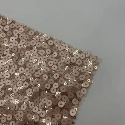 Cina Fabbrica di ricami di sequine a maglia dorata 100% poliestere Buona per le donne Abiti da festa in vendita
