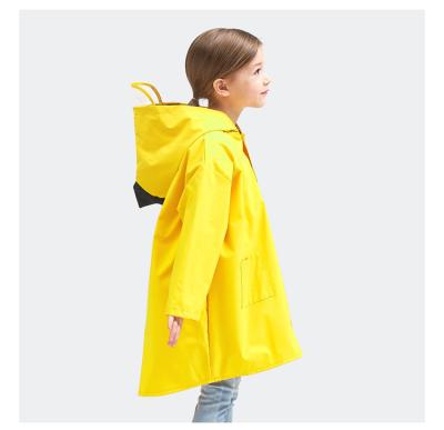 China Capa de chuva impermeável das crianças do dinossauro para todo o material Multifigure do PVC da estação à venda