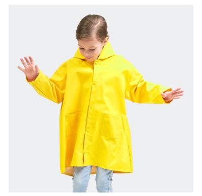 China Capa de chuva impermeável das crianças do dinossauro para todo o material Multifigure do PVC da estação à venda