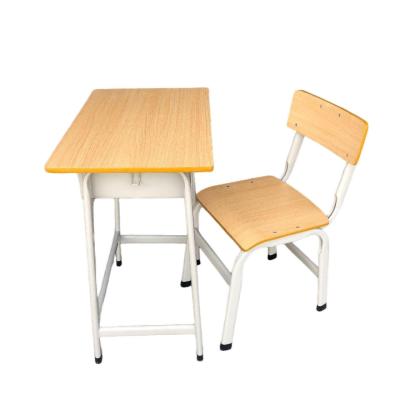 China Wooden Grain Primary School Single Desk And Chair Set For Classroom Furniture for sale