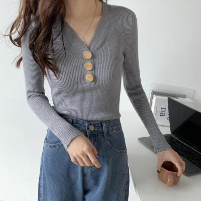Cina Le signore lungamente collegano il pullover con un manicotto che il collo a V profondo tricotta il maglione con i bottoni in vendita