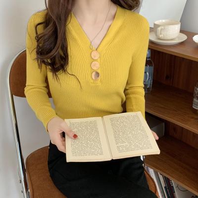 Cina Le signore lungamente collegano il pullover con un manicotto che il collo a V profondo tricotta il maglione con i bottoni in vendita