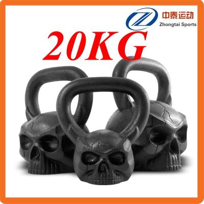 China Wholesale cheaper custom skull shaped cast iron  kettlebell with face for sale