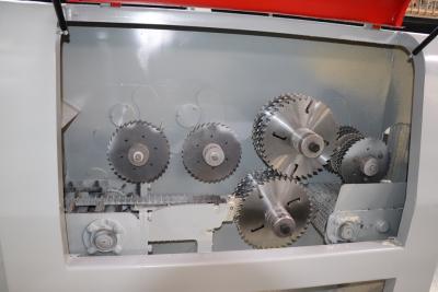 China Round log cutting multiple rip saw machine, multi blade circular saw rip saw wood cutting machine for sale