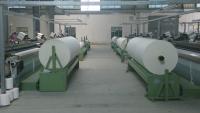 China Horizontal Automatic Electric Motor Winding Machine Textile Roll Winder Machine for sale