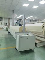 China Horizontal Automatic Electric Motor Winding Machine Textile Roll Winder Machine for sale