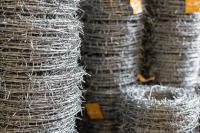 China Galvanized Single Twisted Barbed Wire Roll for Protective Construction Length Customers' Demand for sale