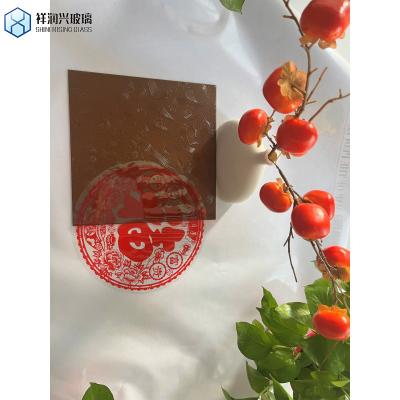 Cina Personalizzazione vetro marrone/bronzo colorato con disegni diversi in vendita