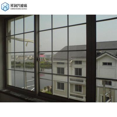 Cina Qingdao Double Glazing Low E Coating Argon Gas Insulating Safety Glass per la costruzione di pareti a tenda in vendita