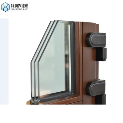 Cina Qingdao Double Glazing Low E Coating Argon Gas Insulating Safety Glass per la costruzione di pareti a tenda in vendita