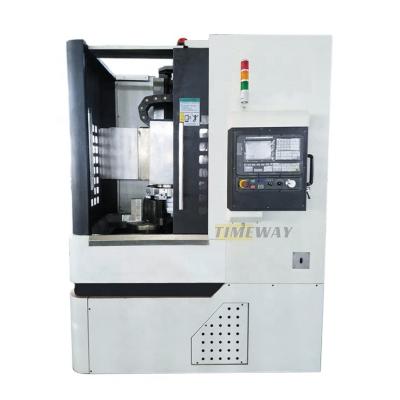 中国 高精度垂直ターニングセンター 100mm スピンドル 穴と 220V/380V 電圧 販売のため