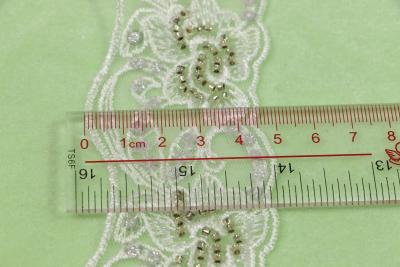 China ODM de witte bruids Bloem van de kantversiering borduurde Botanische doorzichtige paillettes Te koop