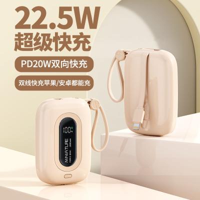 China Portable 15W 10000 Mah Smart Wallet Power Bank Built In Cables Fast Charging for sale