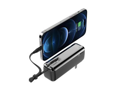 Cina 5000mAh Capsule Power Bank e Wall Charger Mini Portable Charger per tutti i dispositivi in vendita