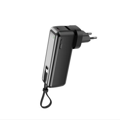 Cina 5000mAh Capsule Power Bank e Wall Charger Mini Portable Charger per tutti i dispositivi in vendita