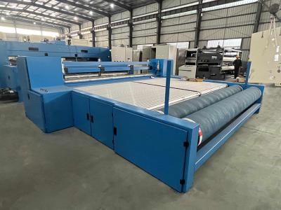 China Piece cutting and rolling dual position winding machine giving versatility design for sale