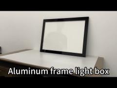How to change the picture of the aluminum frame magnetic light box?