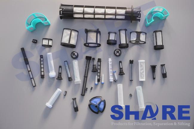 Mesh insert injection moulded filter