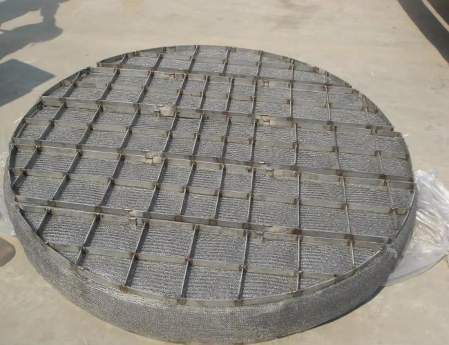 Copper knitted wire mesh packing for distillation columns