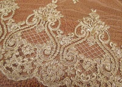 Cina Tessuto nuziale del pizzo dell'oro floreale legato con corde d'annata, tessuto netto ricamato del pizzo per l'abito in vendita