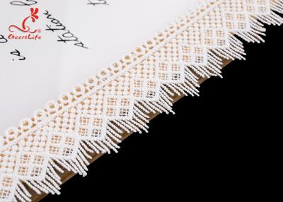 Cina confine africano del nastro della guarnizione della disposizione del pizzo del pizzo del filato del latte di 3Cm del ricamo del fiore francese solubile in acqua di Tulle in vendita