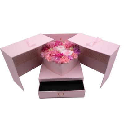 Cina Il cuore magico del cubo ha modellato il contenitore di fiore, rose conservate in scatola del cuore in vendita