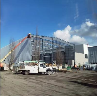 China Steel Structure Building Construction Combining Durability and Spacious Design with Prefabricated Long Span Steel Panels for sale